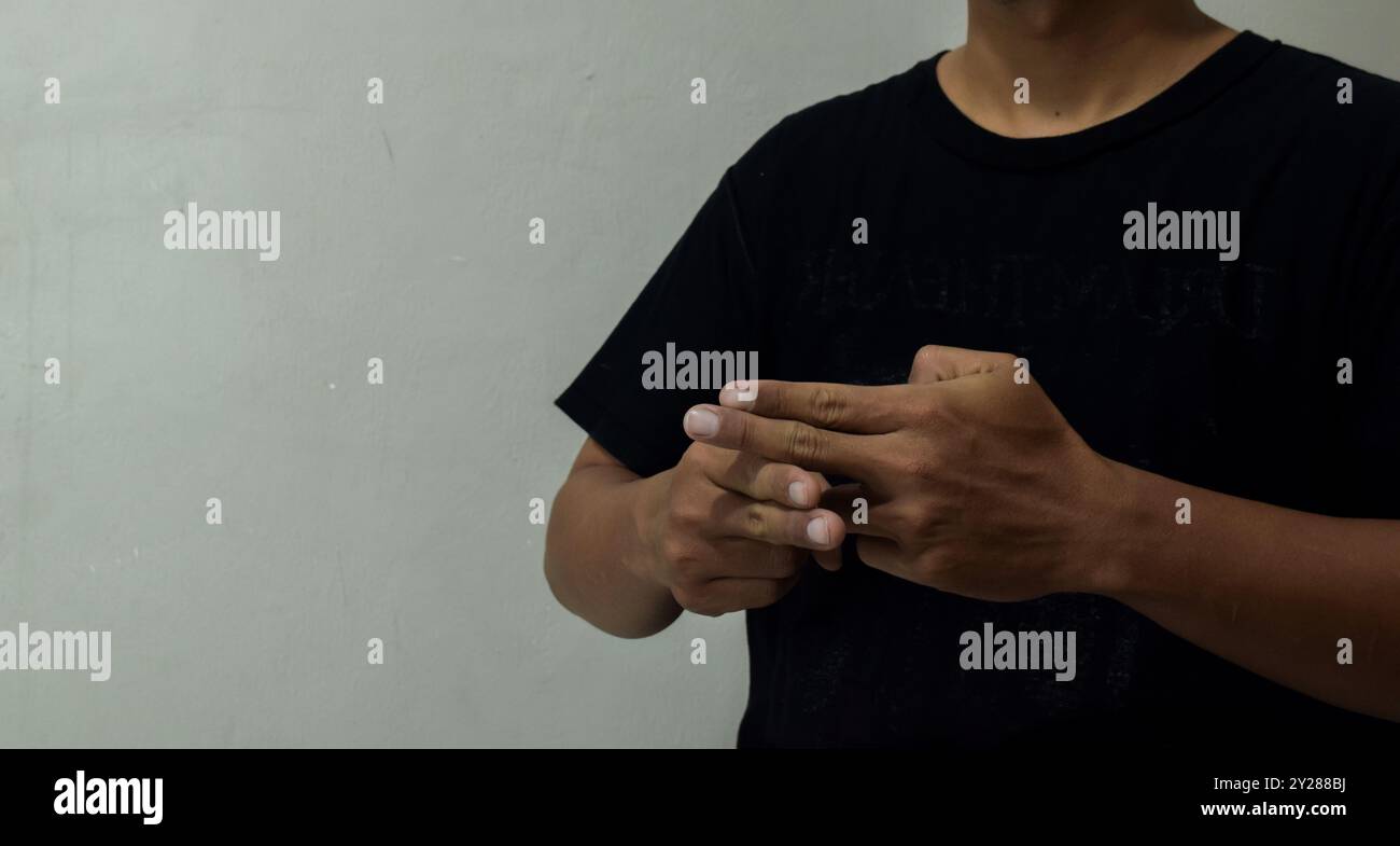 young man using sign language interpreter to communicate Stock Photo ...
