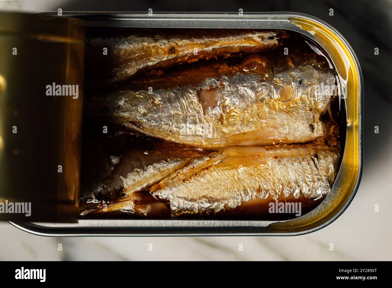 tinned sardines in olive oil with crackers Stock Photo - Alamy