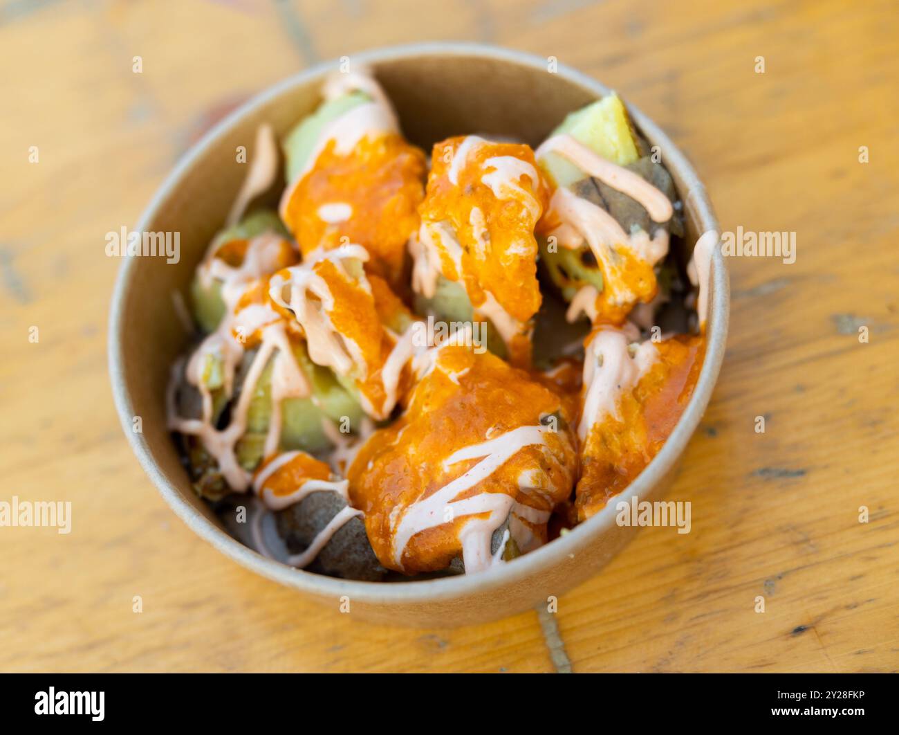 Main course in Spanish cafes and bars is potato tapas with mixture of ...