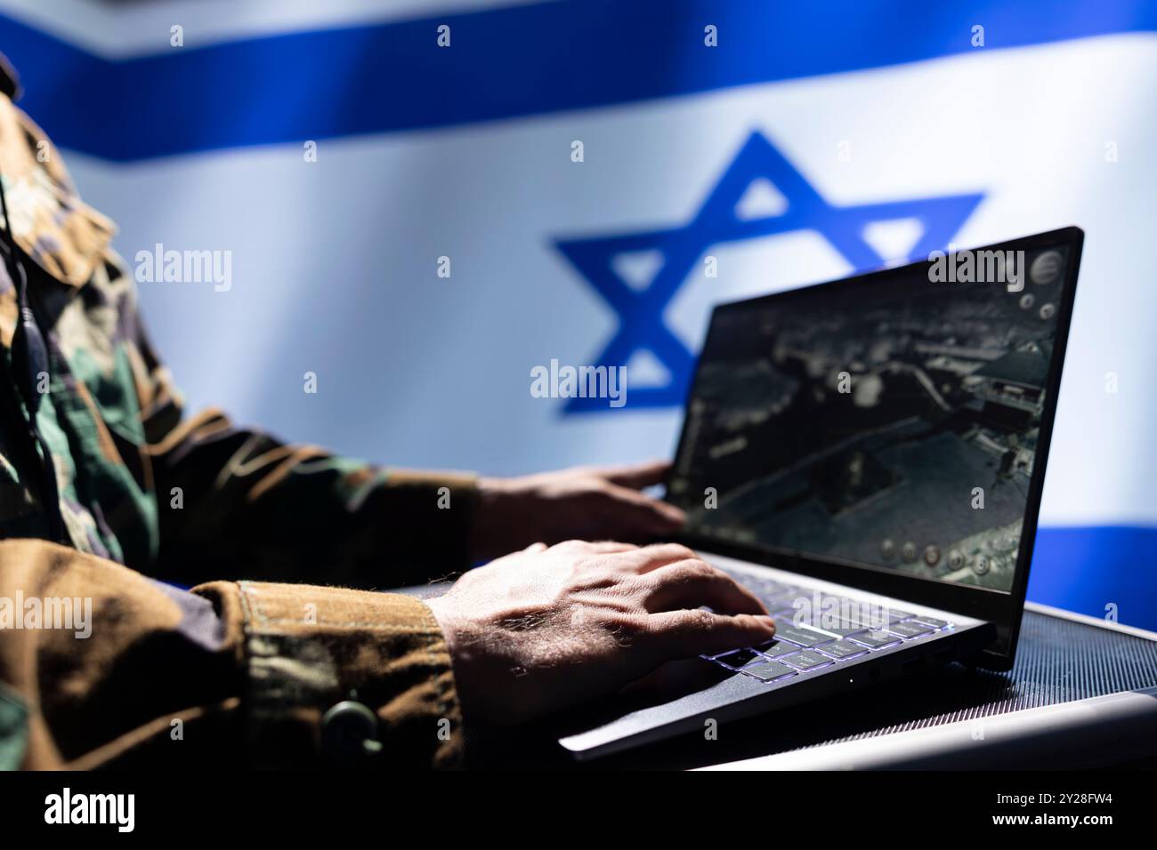 IDF military operative uses notebook device to analyze surveillance ...