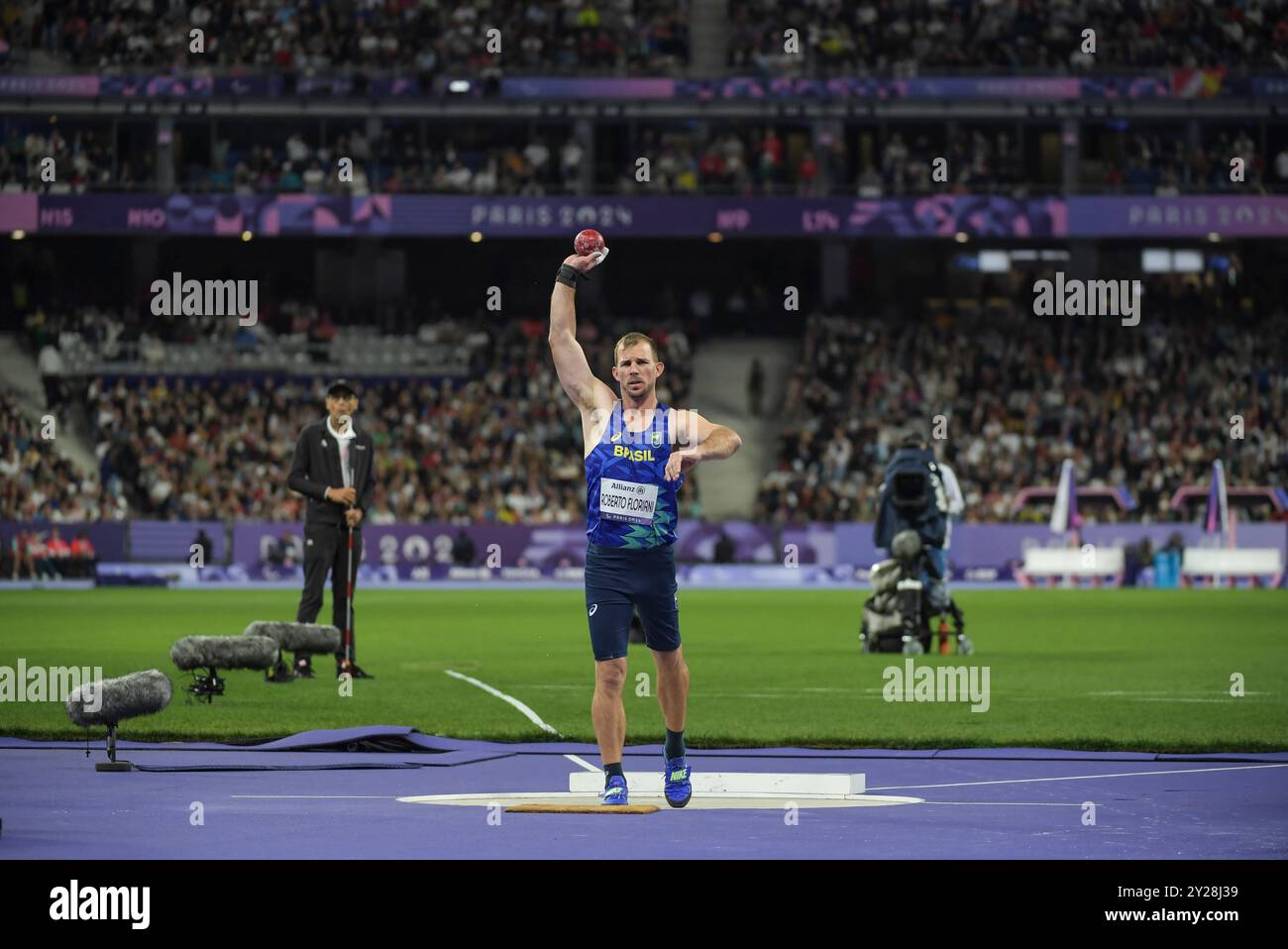 Edenilson Roberto Floriani of Brazil competing in the men F63 shot put ...