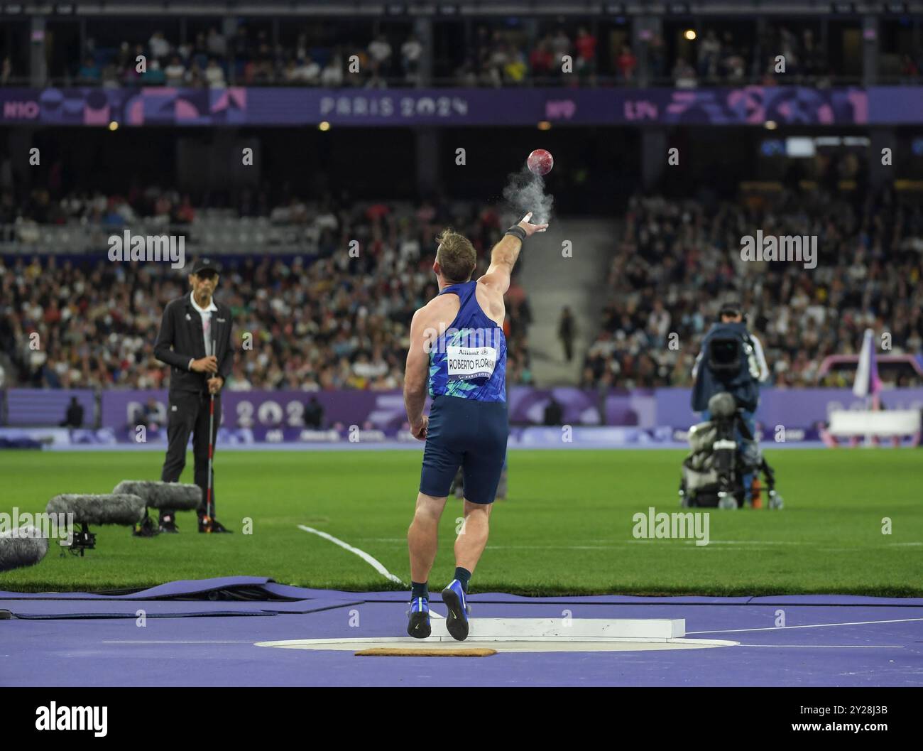 Edenilson Roberto Floriani of Brazil competing in the men F63 shot put ...