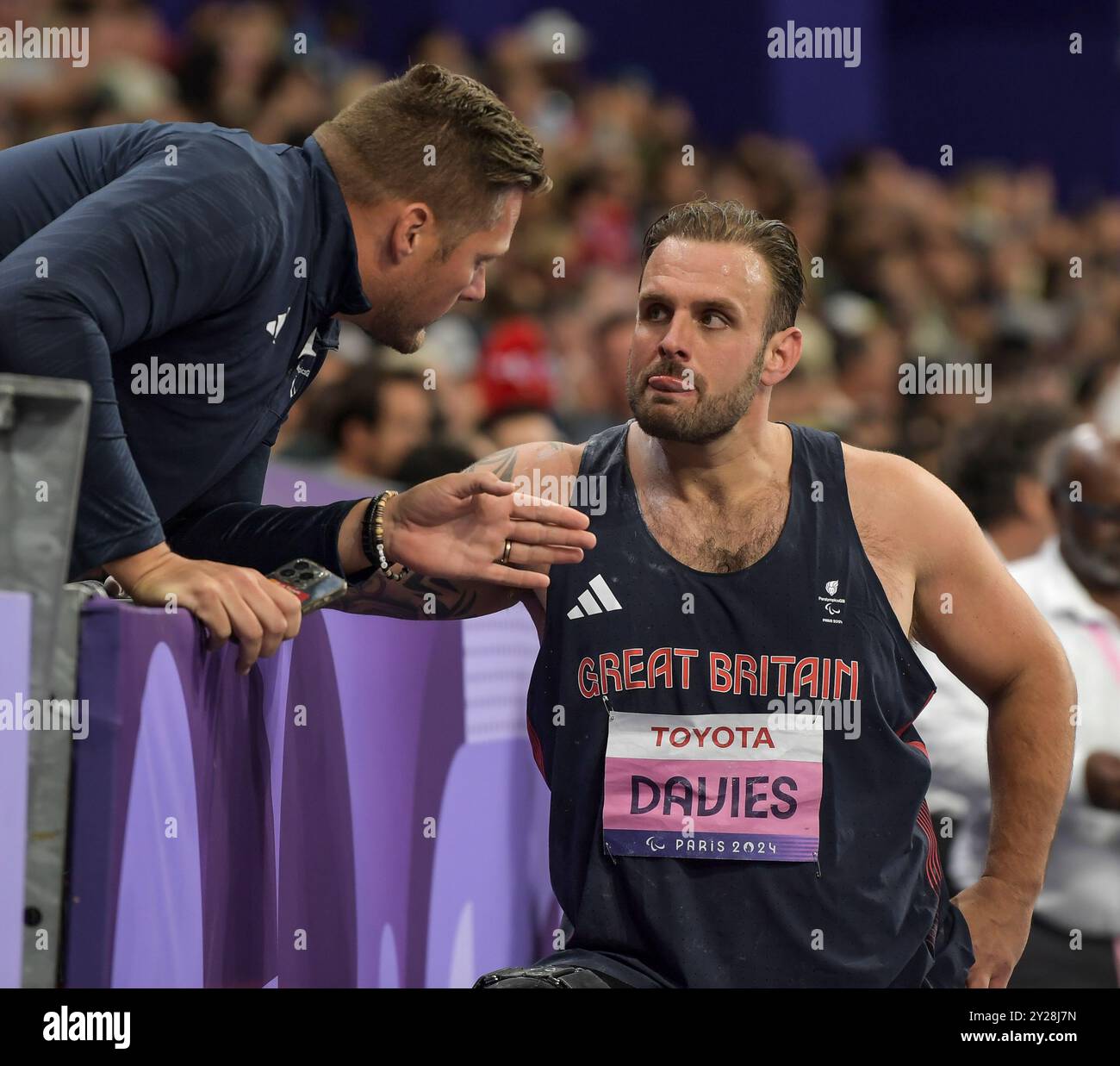 Ryan Spencer Jones (Coach) of Aled Davies of Great Britain competing in ...