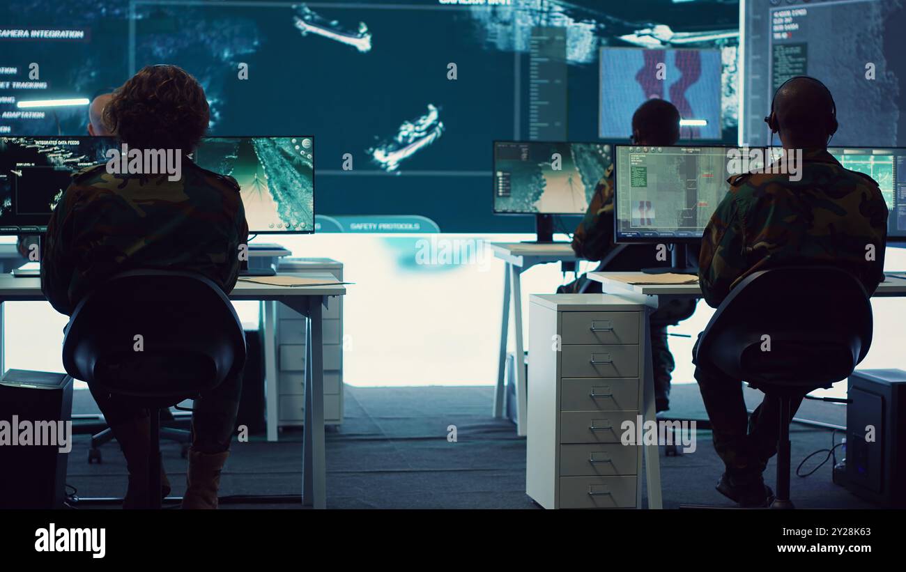 Military crew working in reconnaissance control tower power base ...