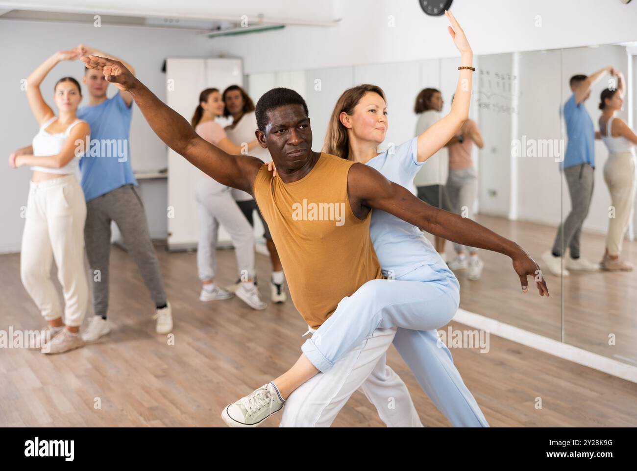People dancing together slow ballroom dances in pairs in choreography ...