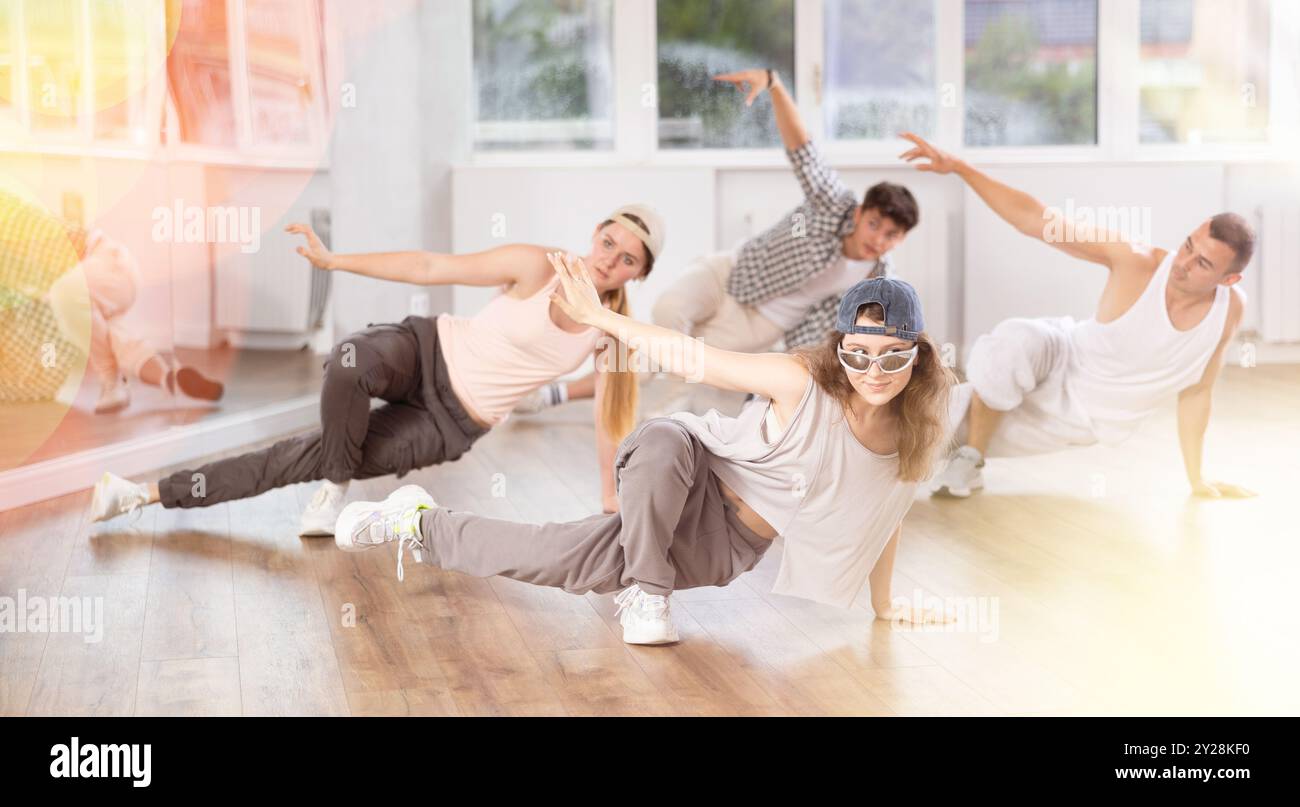 Young girl practicing breakdance floor-works in training hall Stock ...