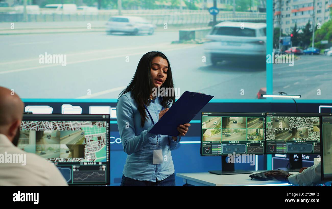 Indian supervisor leads her team to monitor the surveillance video ...