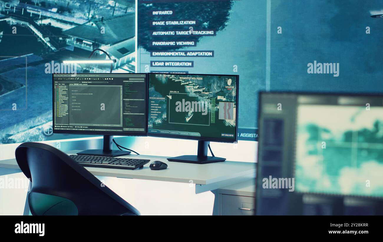 Empty military command headquarters with a big display and workstations ...