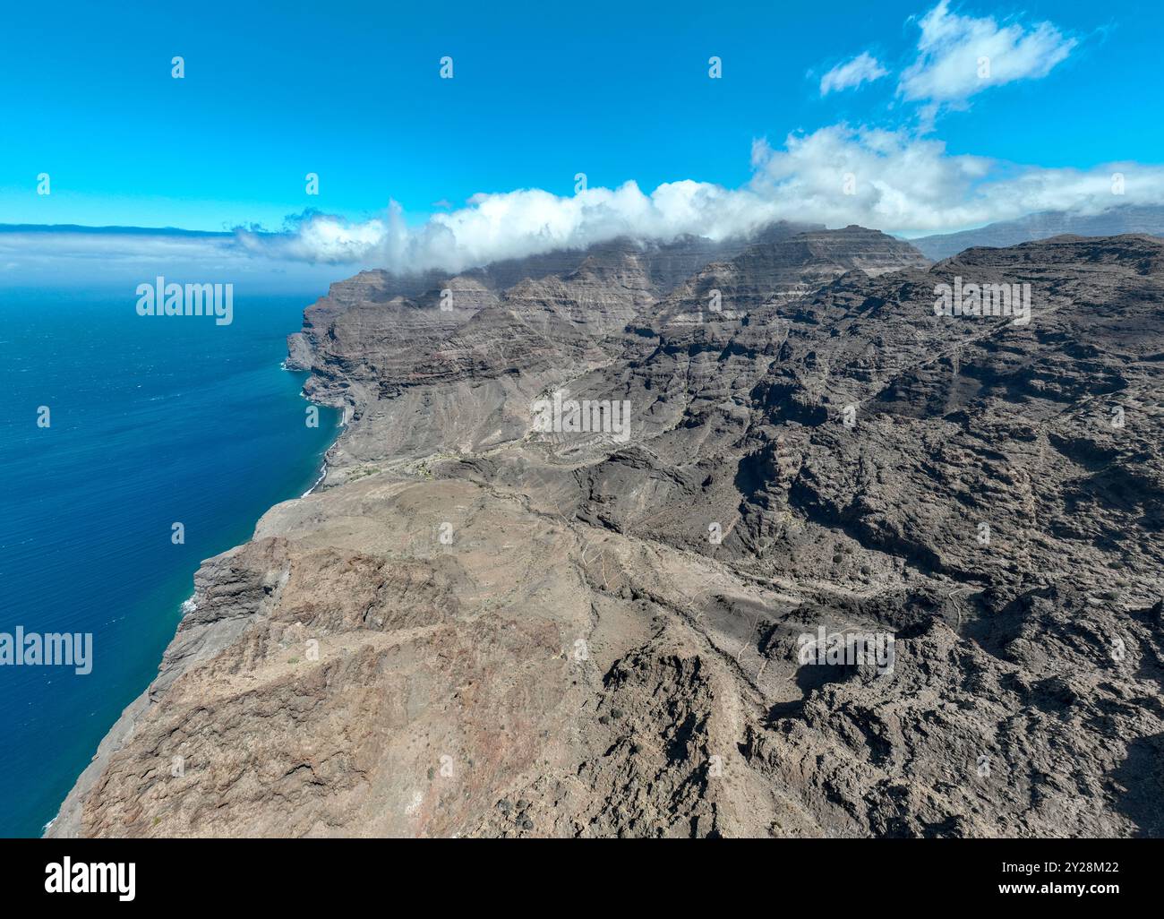 Aerial view of the trail through the mountains to Guigui beach ...