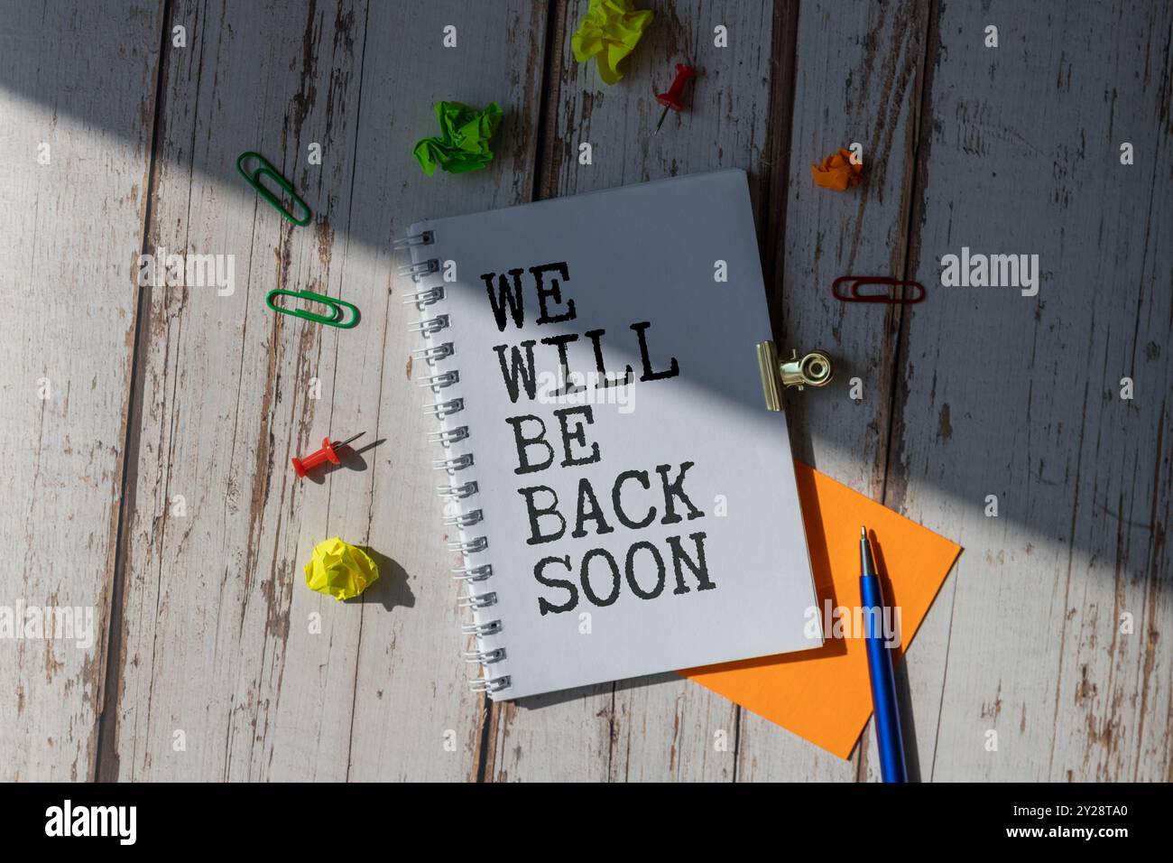 We'll Be Back Soon text on notepad, concept background Stock Photo - Alamy