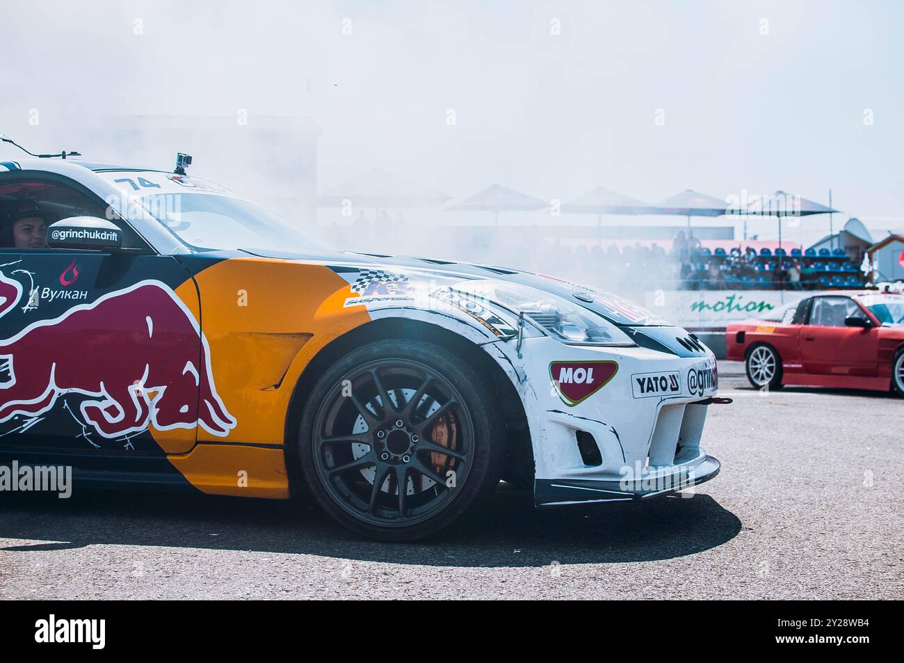 Race car drifting on speed track, Professional driver drifting car on ...