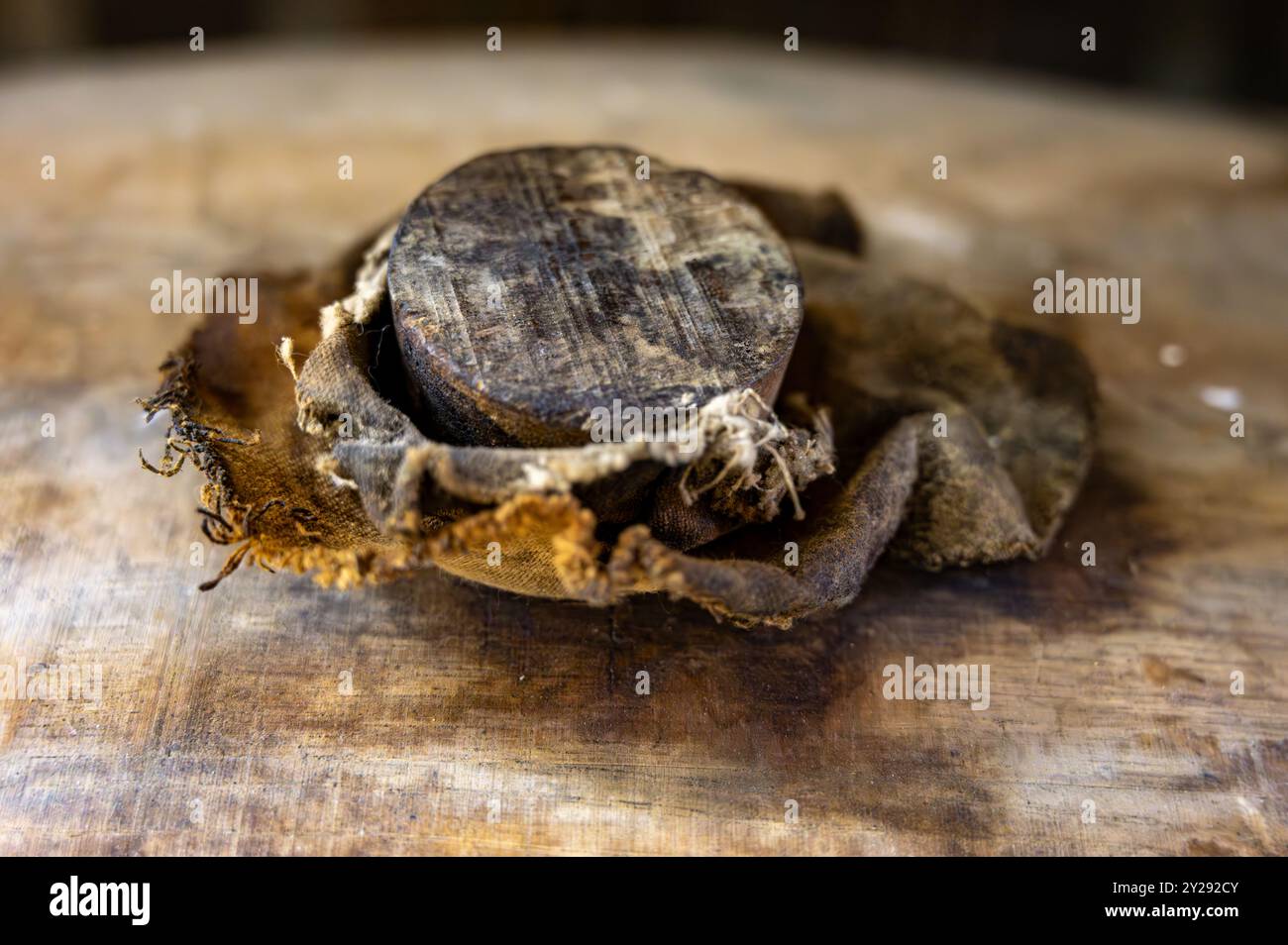 Aging process of cognac spirit in old dark French oak barrels in cool ...