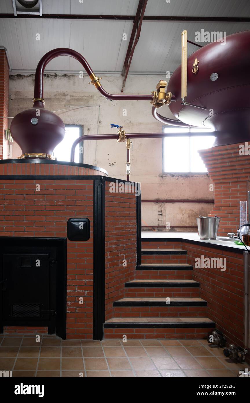 Double distillation process of cognac spirits in Charentias copper ...