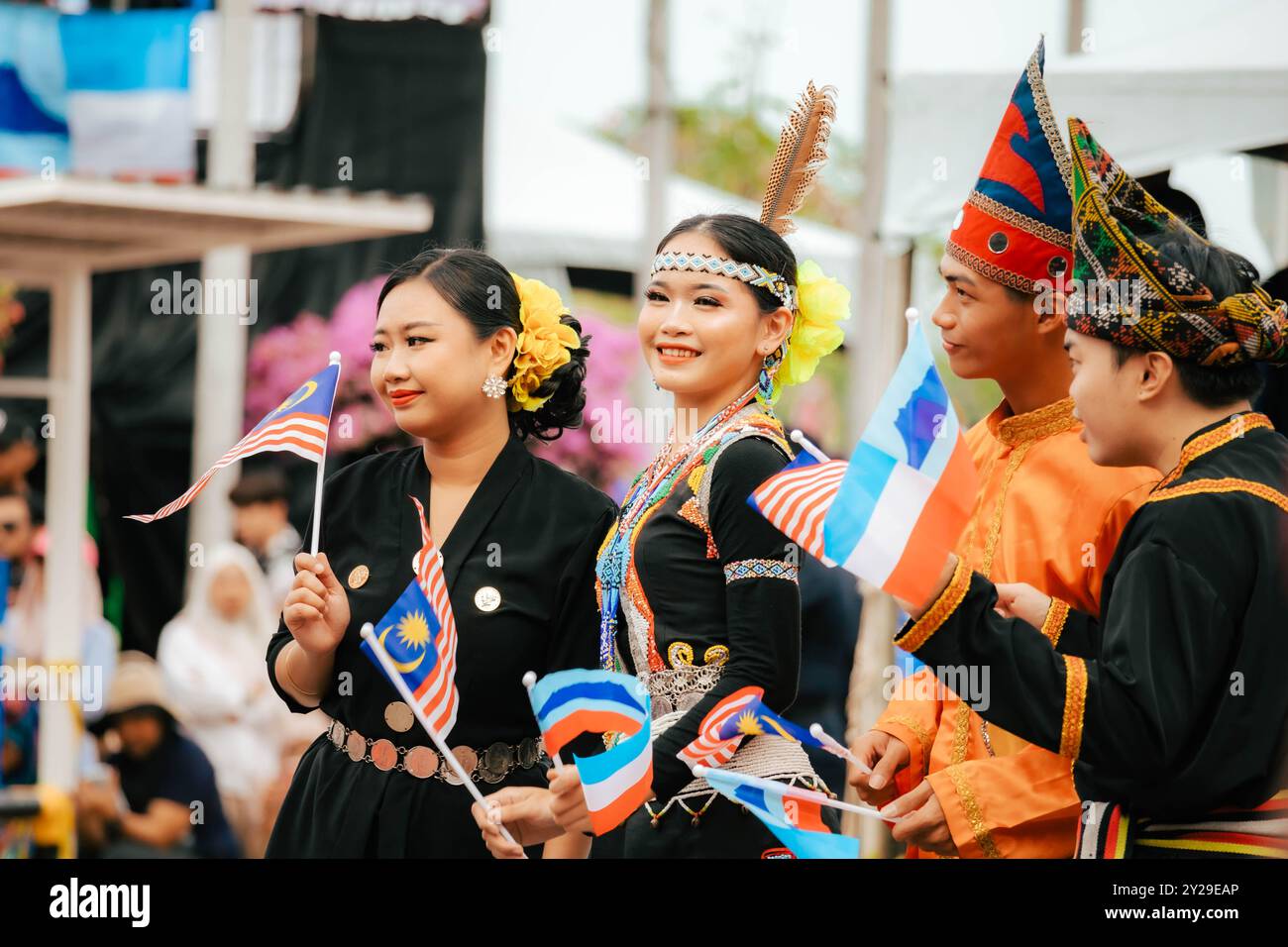 Sweet smile of young women in traditional costume of Sabah, Malaysia ...