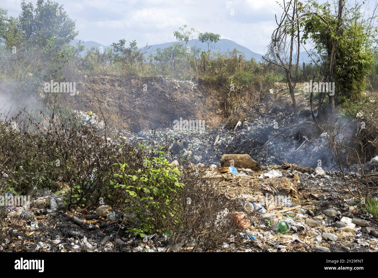 Coking rubbish dump, rubbish pit with waste and plastic rubbish, karst ...