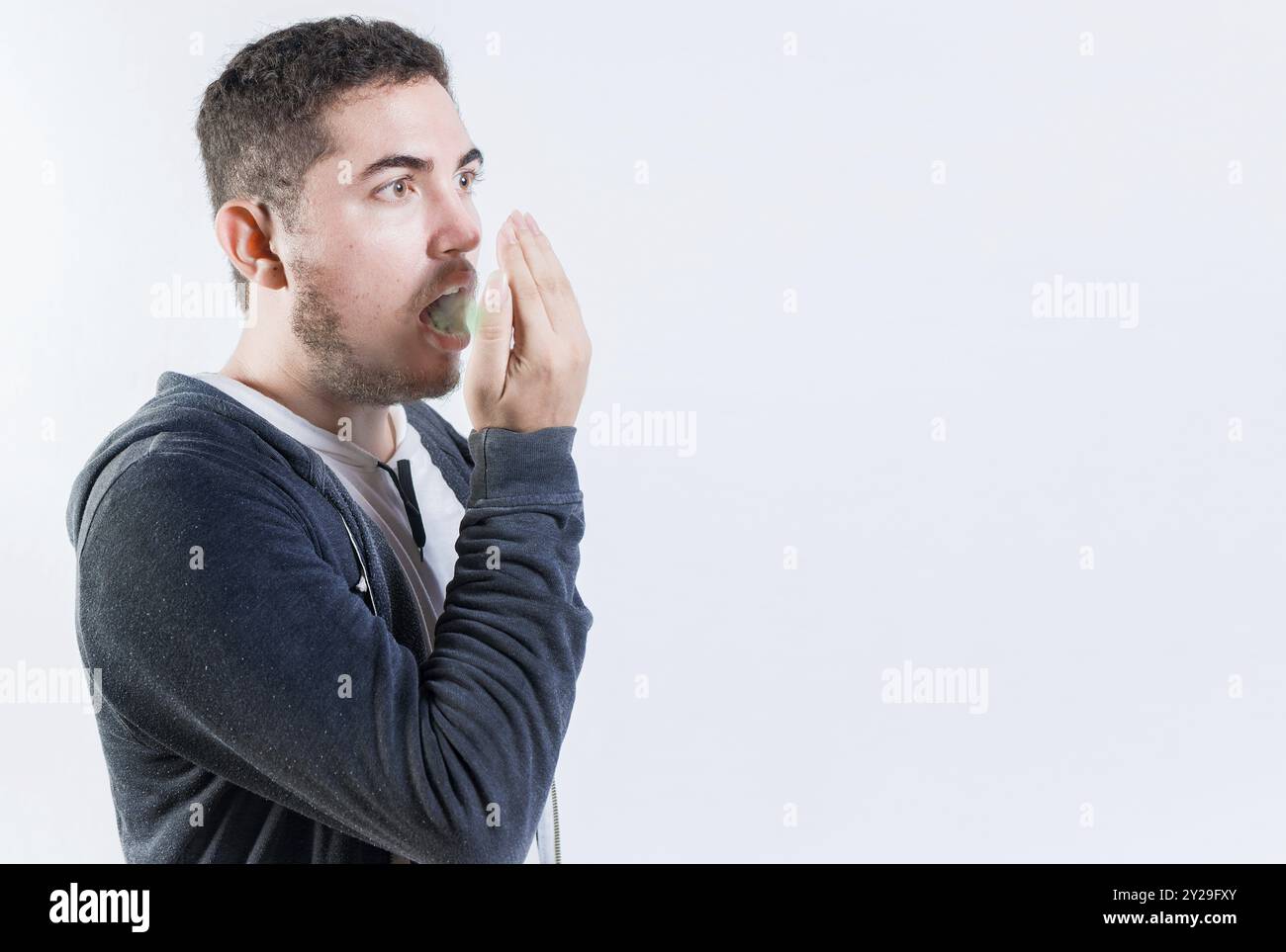 Person with bad breath problem isolated. Man with latisosis checking ...