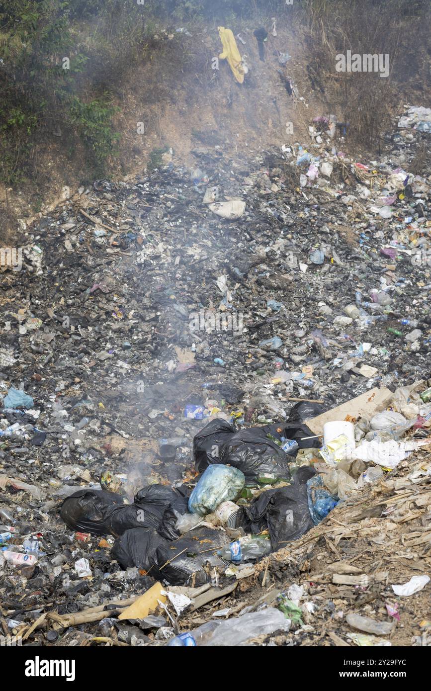 Coking rubbish dump, rubbish pit with waste and plastic rubbish, karst ...
