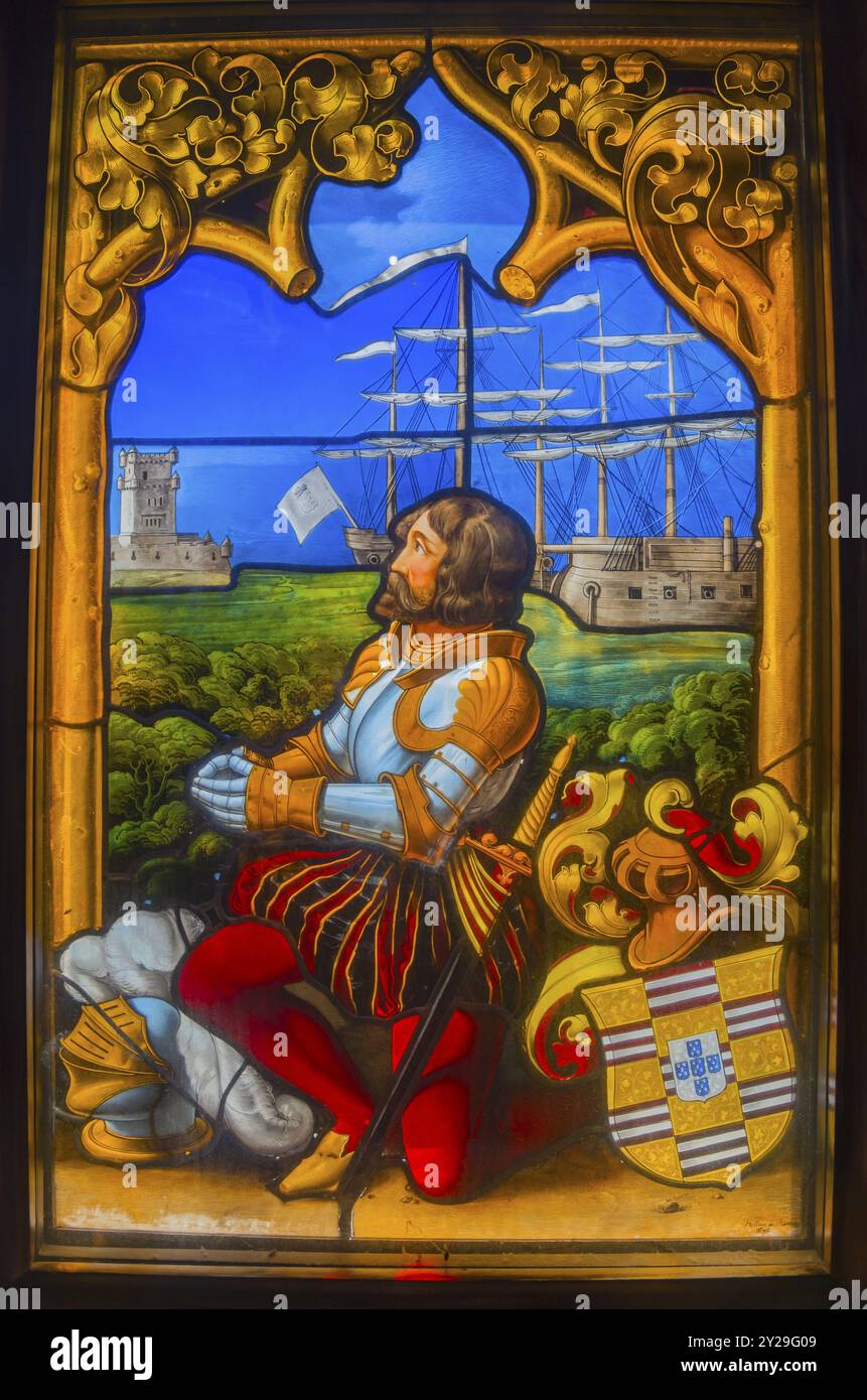 Stained glass window shows a knight in armour with a sailing ship and ...