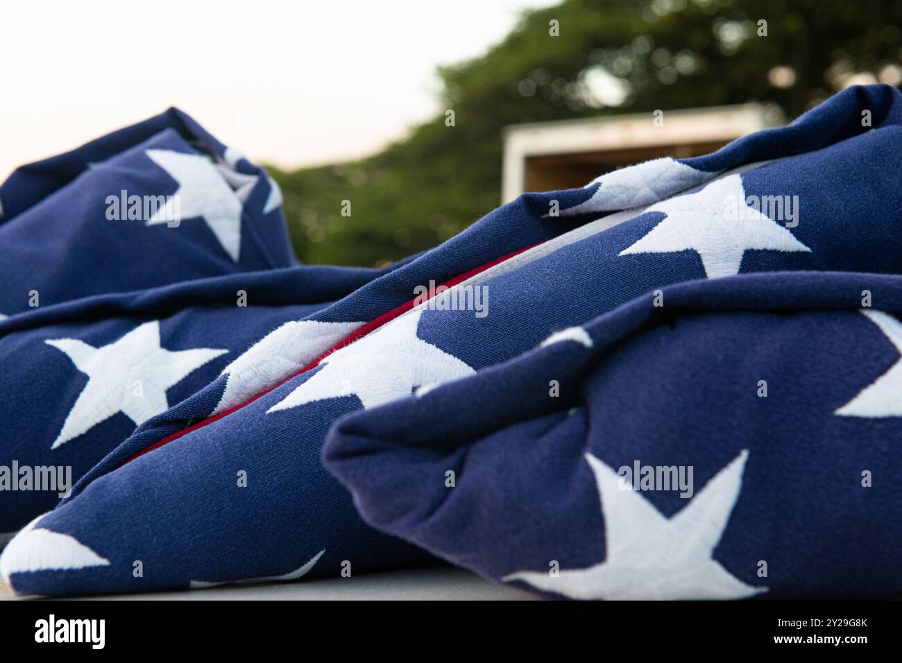 A U.S. flag sits on a table during a Defense POW/MIA Accounting Agency ...