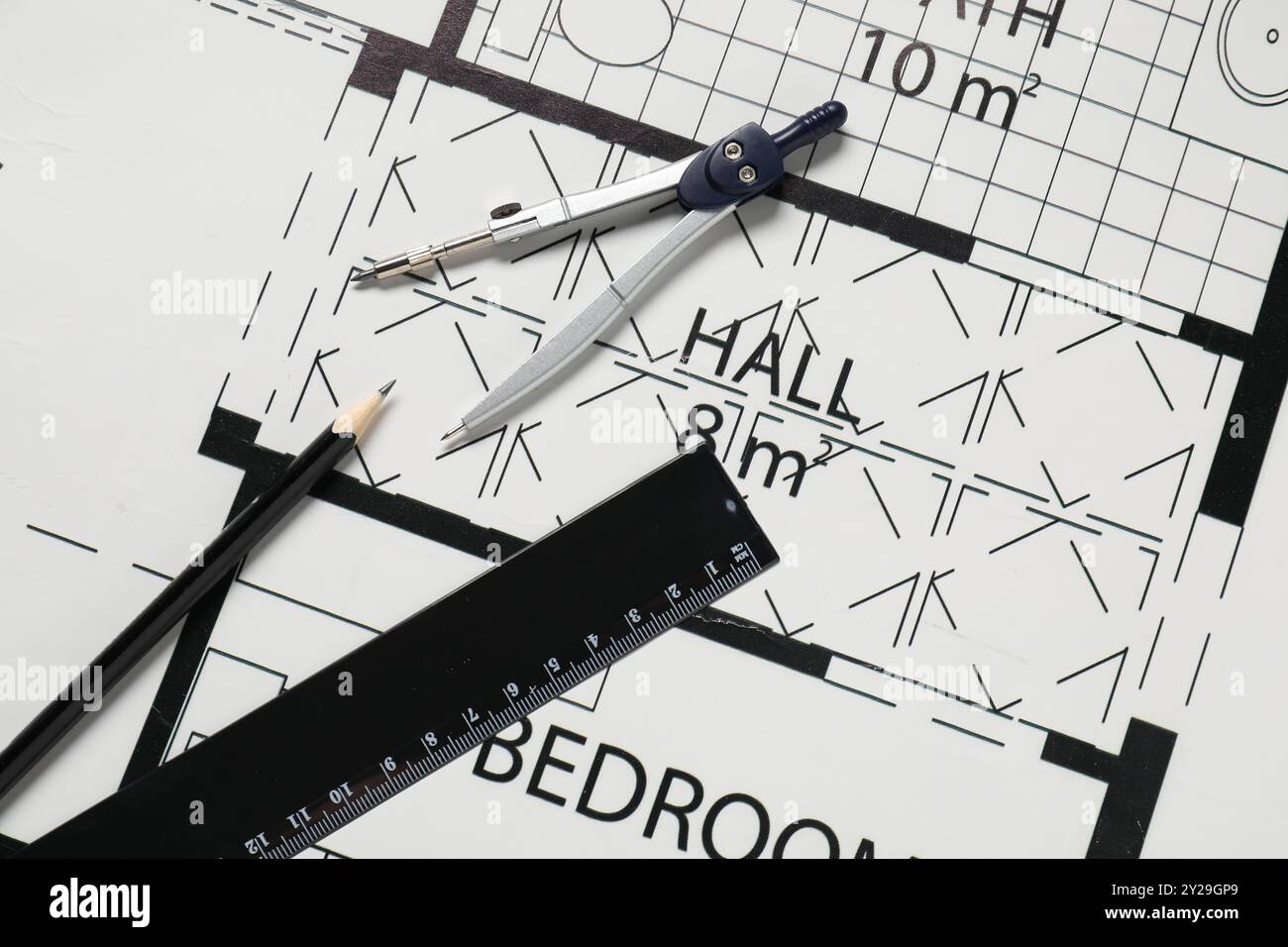 Ruler, pencil and dividers on different engineering drawings, top view ...