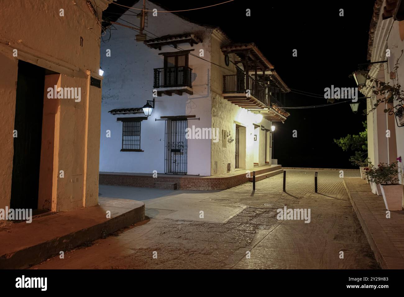 View to typical colonial buildings at night in light of lanterns, Santa ...
