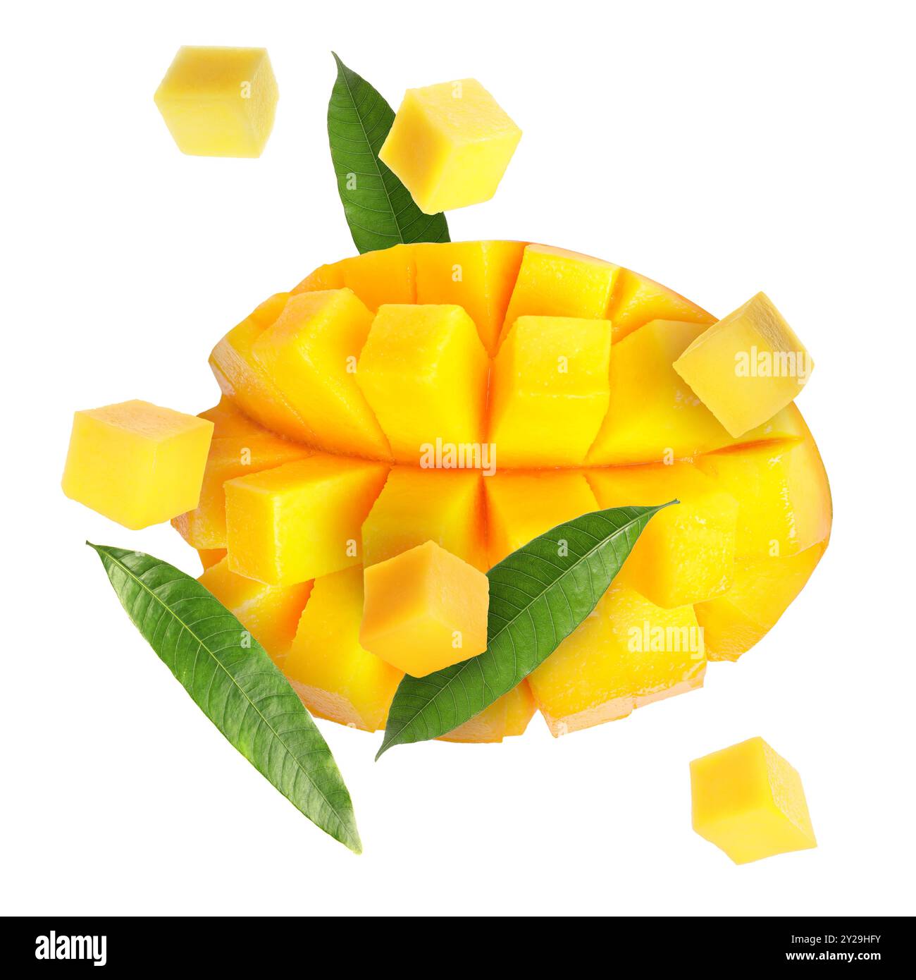 Sweet fresh mango cut in cubes flying on white background Stock Photo ...