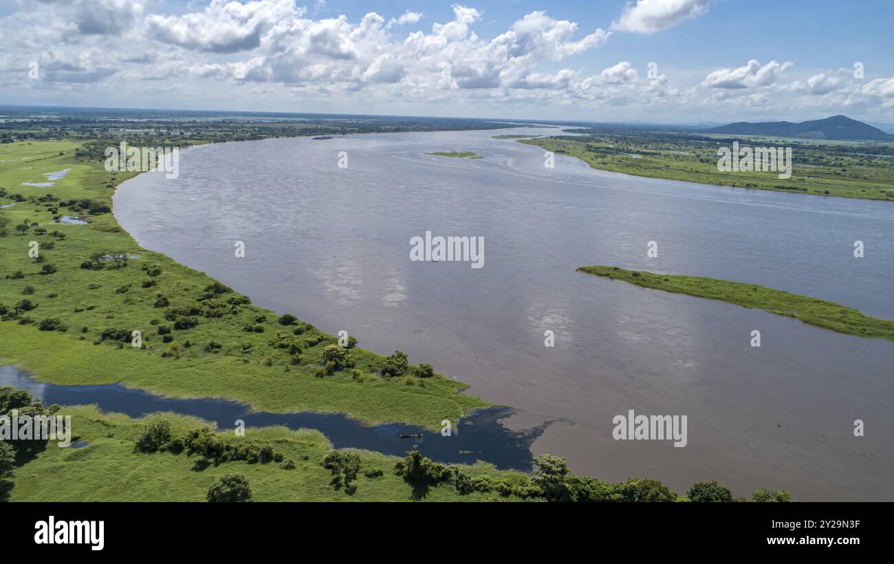 Aerial view Magdalena River and green rural landscape with blue sky and ...