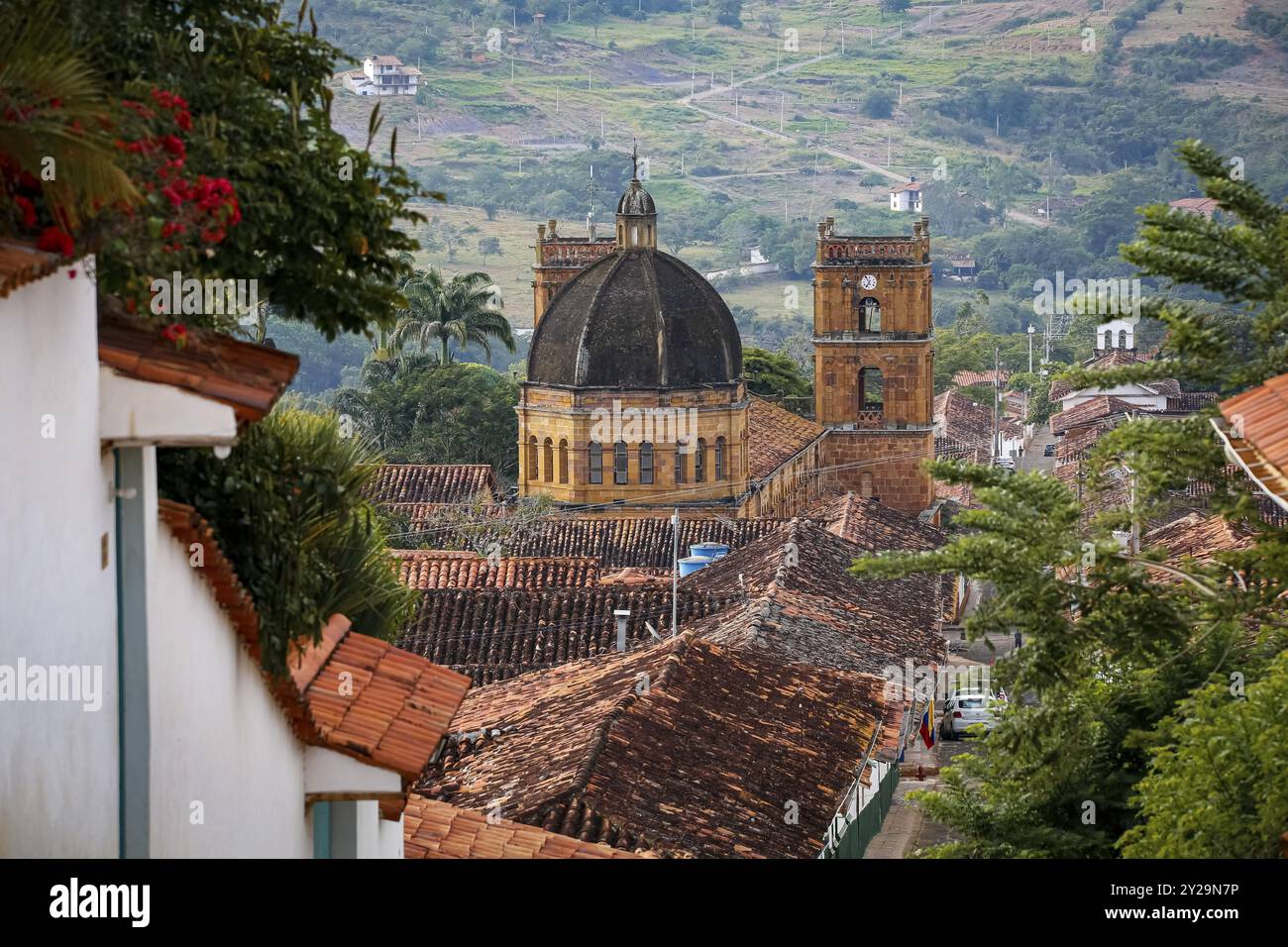 View from top of the town over roofs to historic center of Barichara ...