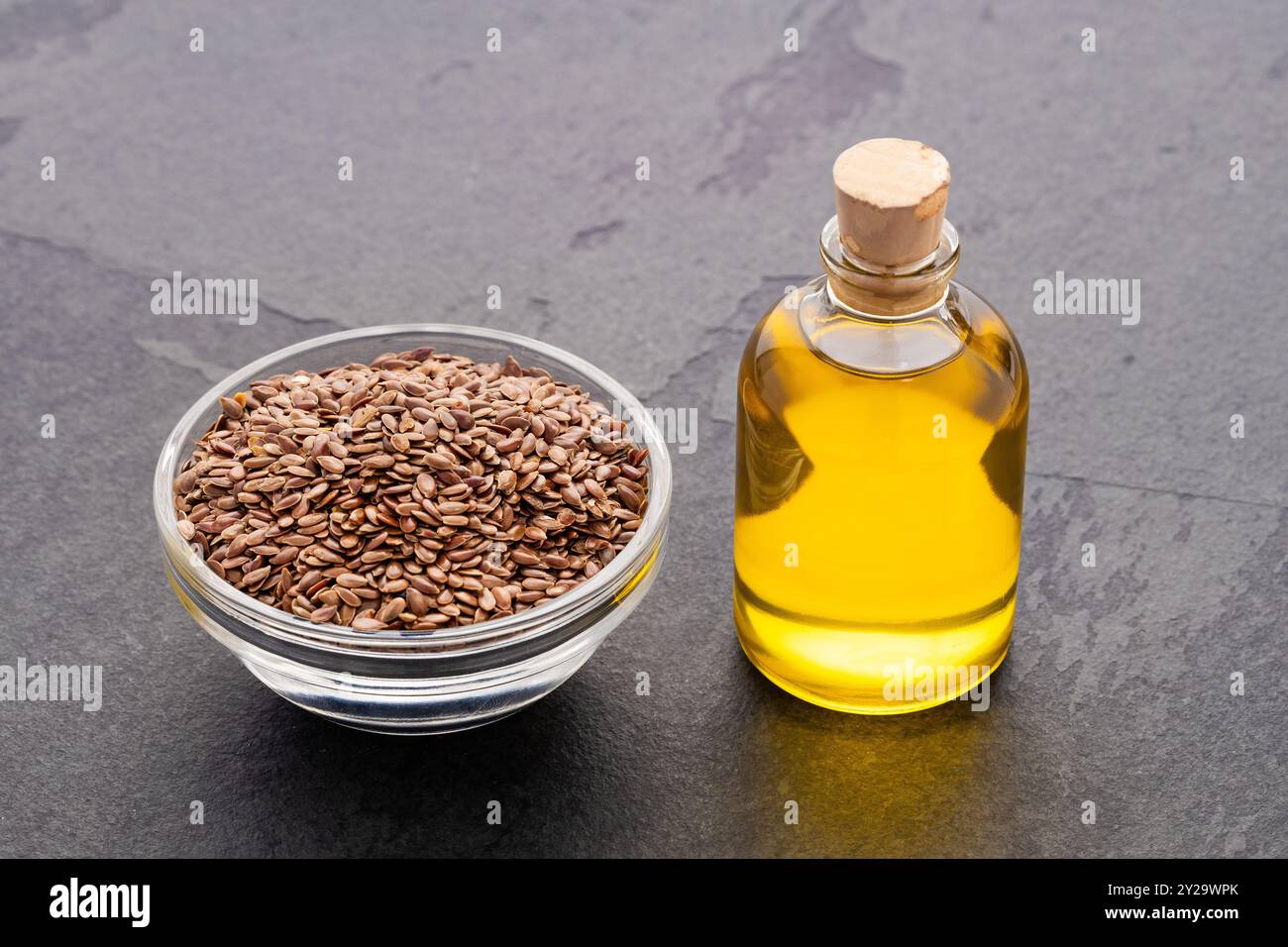 Healthy flaxseed oil - Organic Linum usitatissimum seeds Stock Photo - Alamy