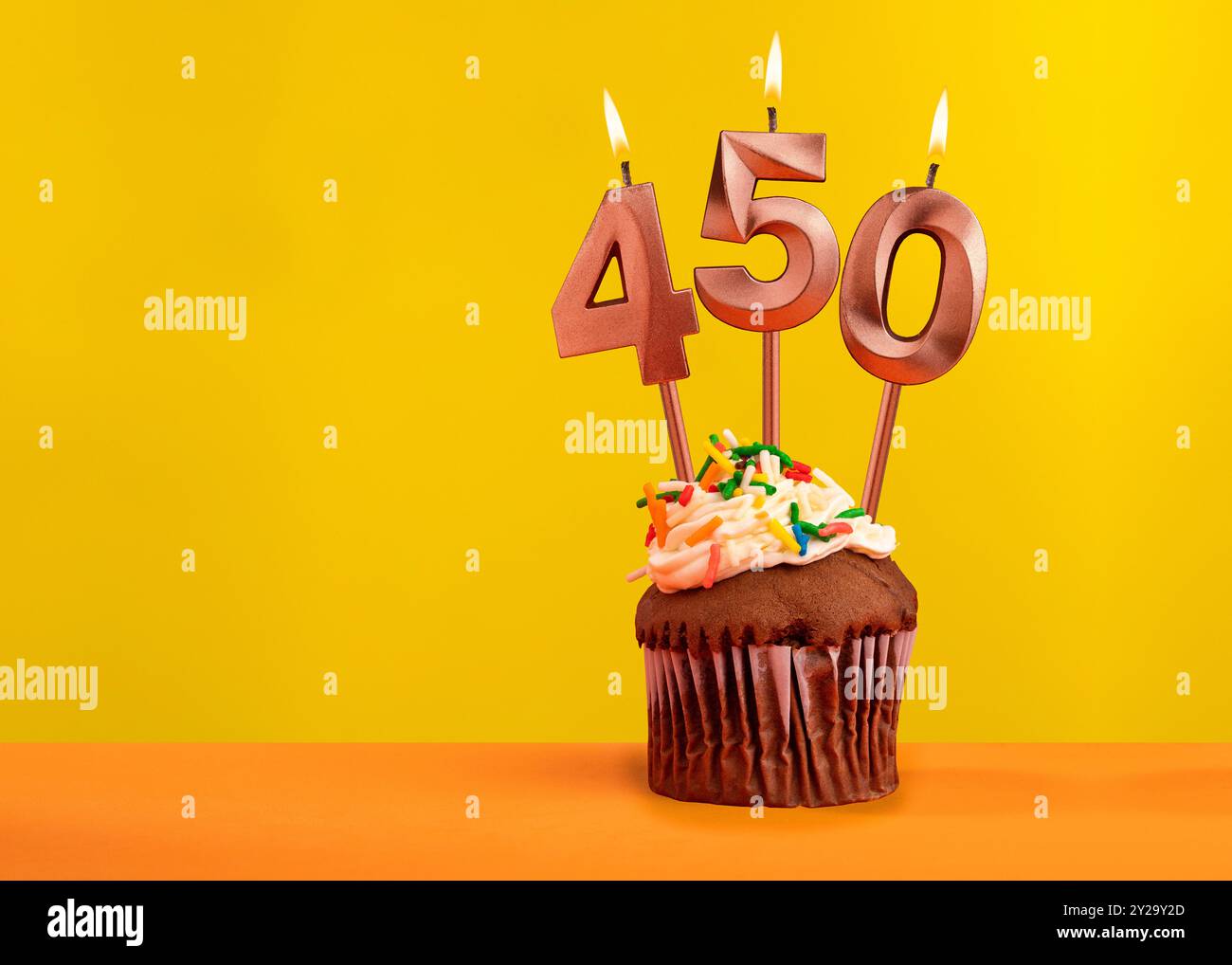 Candle with flame number 450 - Anniversary card on yellow background ...