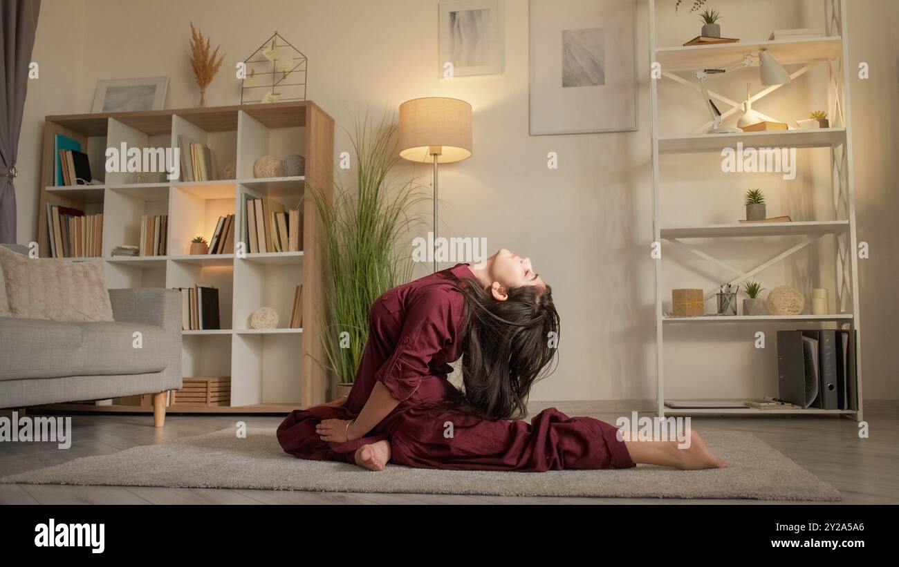 Yoga stretching. Flexibility exercise. Active hobby. Mindful woman ...