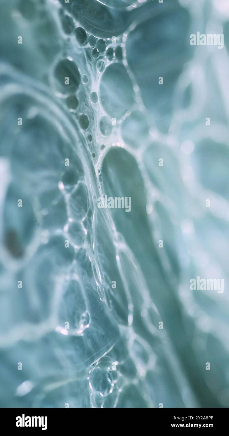 Silver foam. Bubble ink. Defocused gray white color spilling oil drops ...