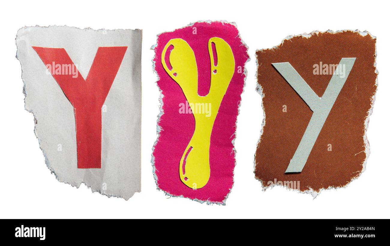 Y alphabet torn from a magazine paper on white background with clipping ...