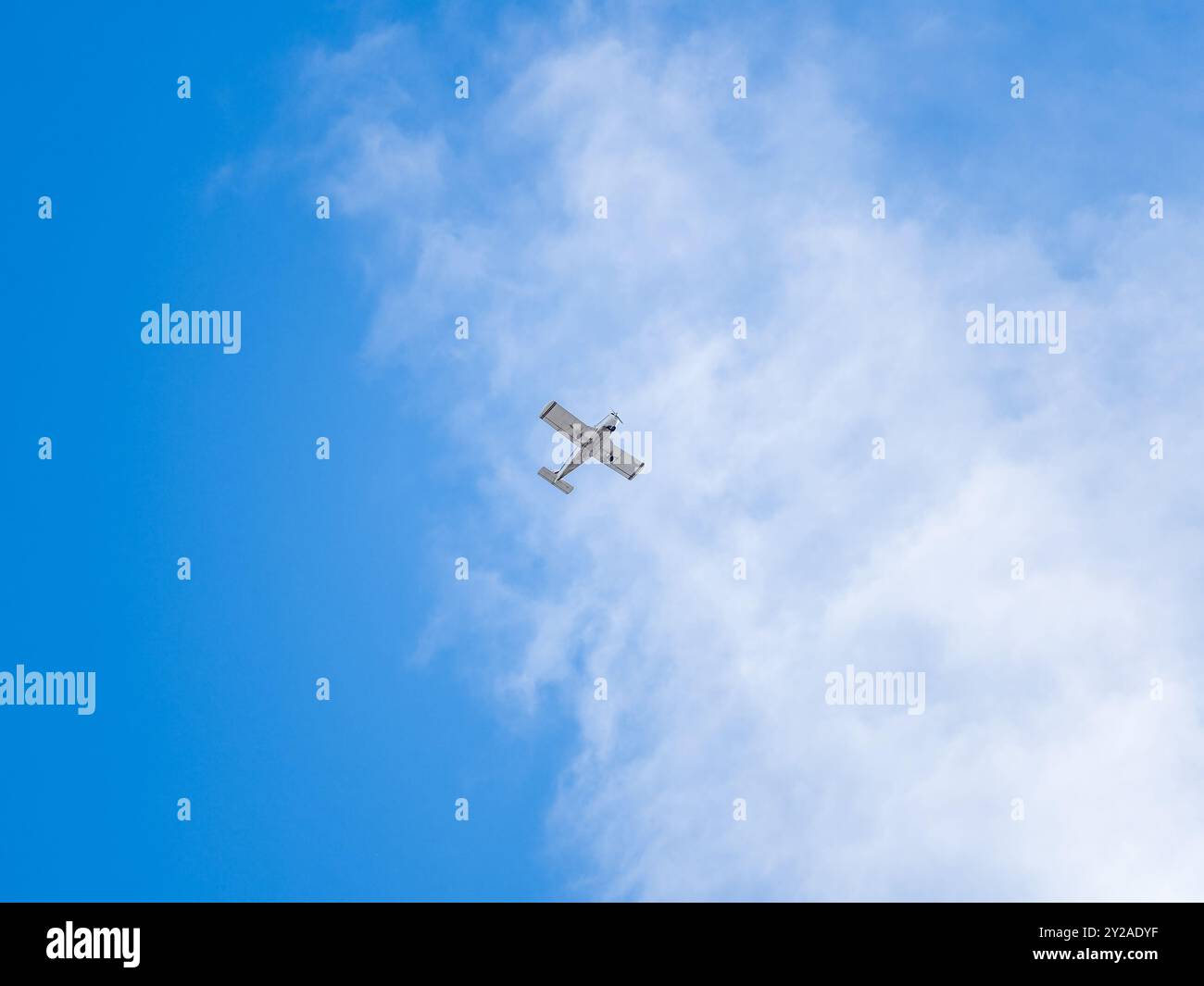 Small ultralight airplane with overhead wing and single propeller ...