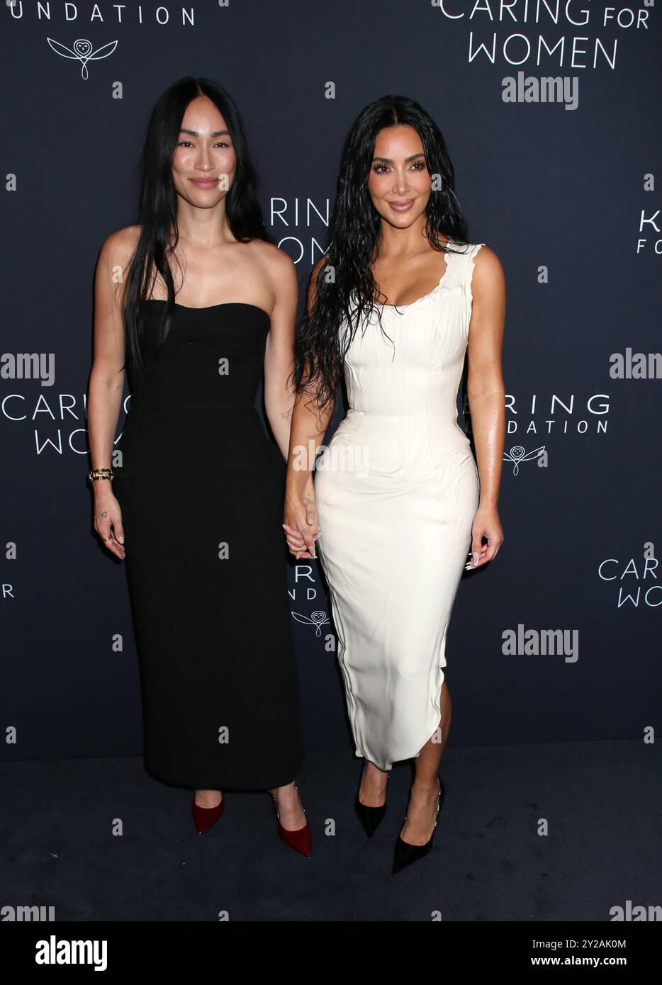 Stephanie Suganami and Kim Kardashian attending Kering Foundation's 3rd ...