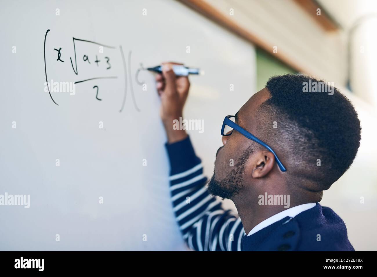 University, maths and teacher writing on whiteboard for lesson ...