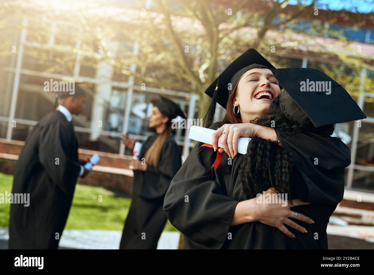 Happy, women and hug for graduation celebration, education achievement ...