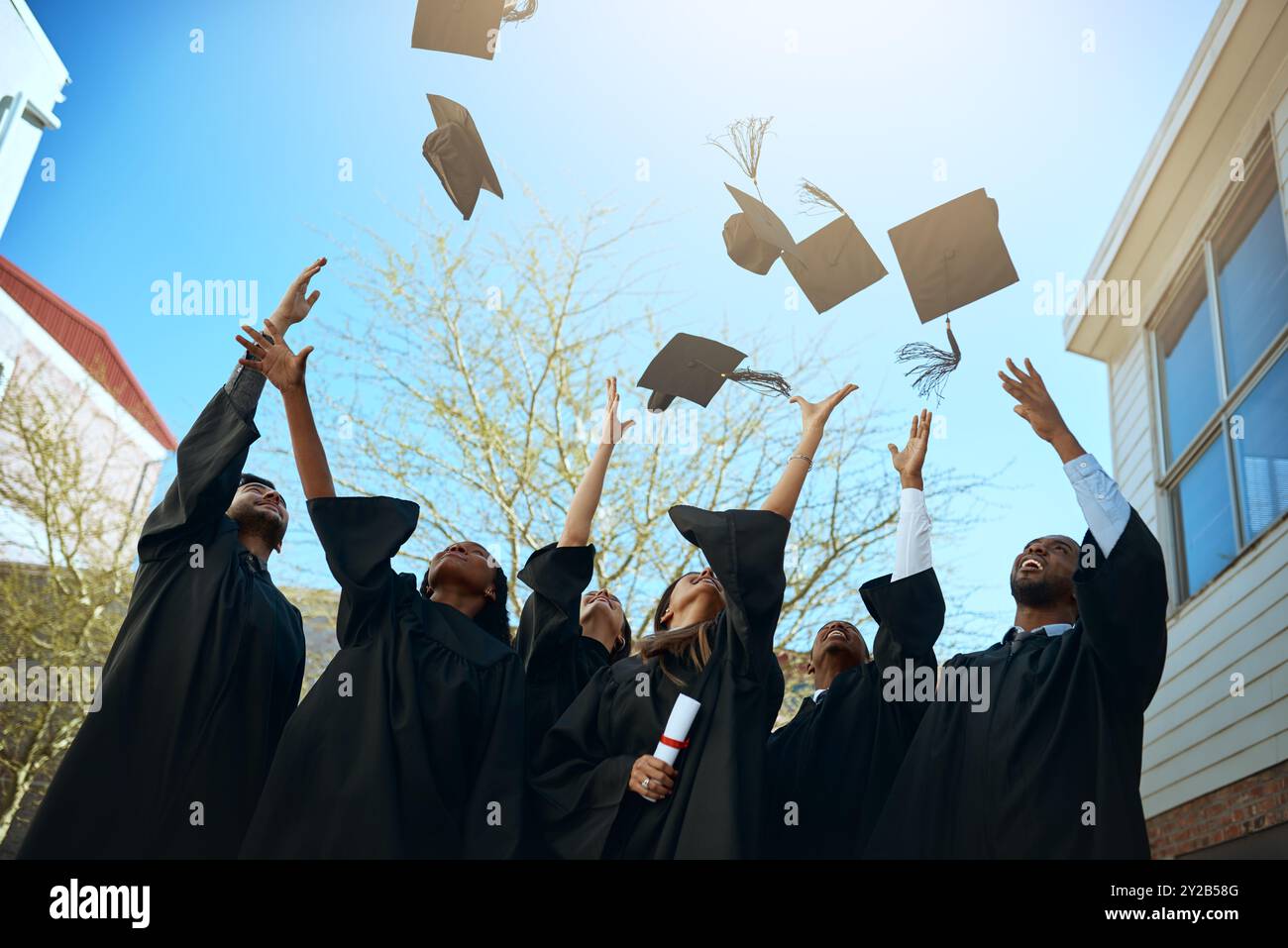 Students, throw and hats for graduation celebration, education ...