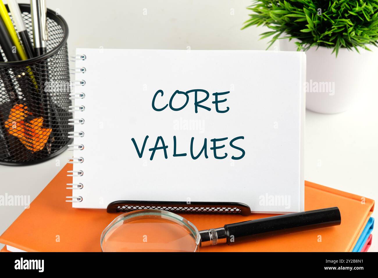 Business and core values concept handwritten text in a notebook ...