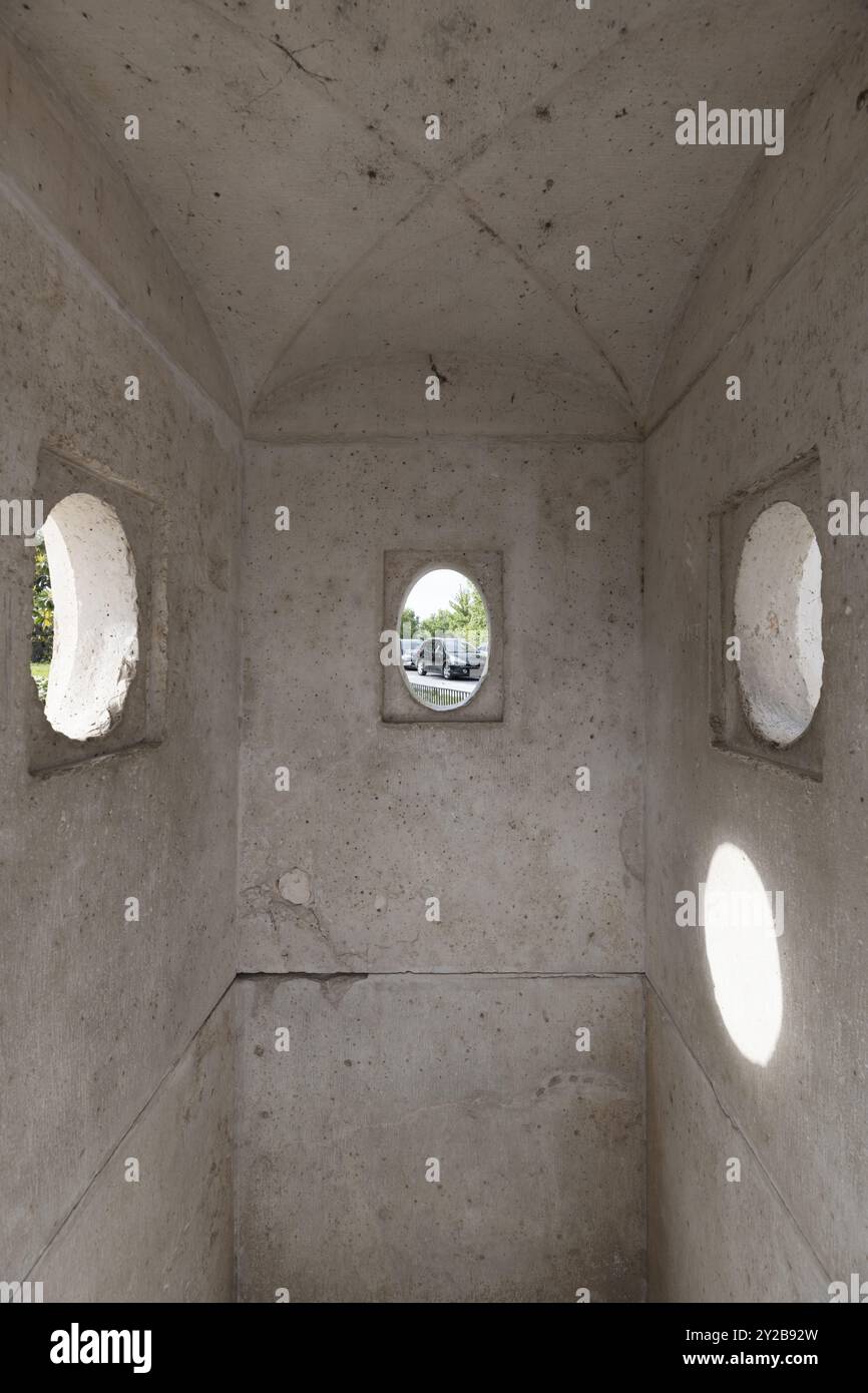 A small oblong window in a white stone wall of an old guardhouse Stock ...