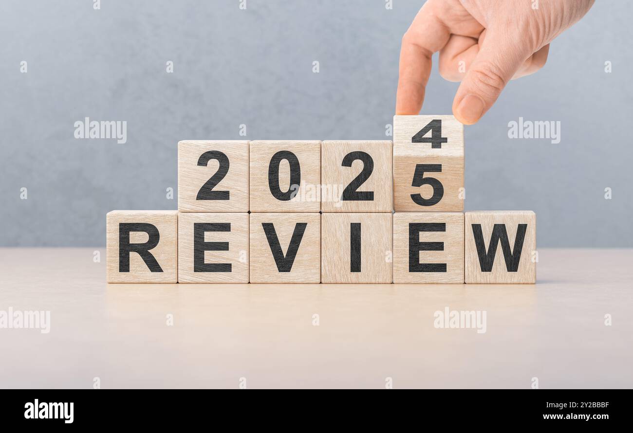 Review 2025. hand flips wooden cube and changes words REVIEW 2024 to ... Review 2025. hand flips wooden cube and changes words REVIEW 2024 to ...