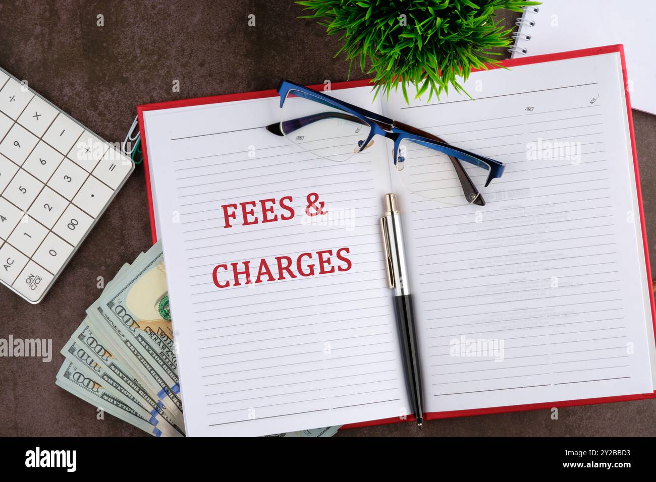 Business concept. FEES and CHARGES words there is an important text in ...
