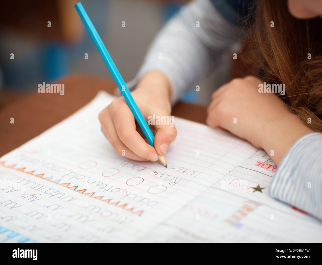 School, writing and hand of girl in classroom with test for growth ...