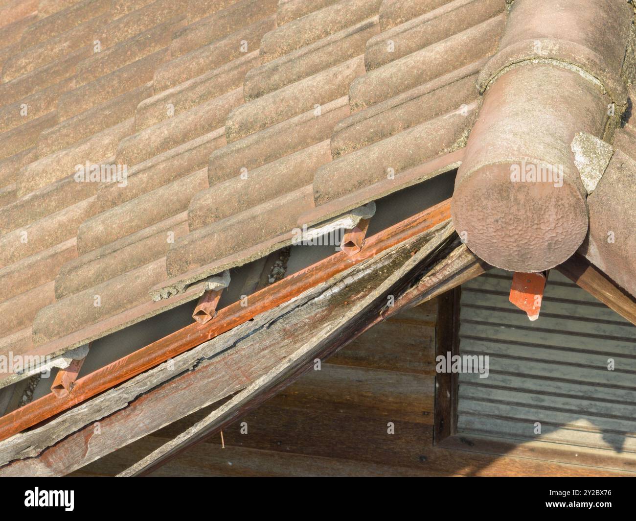 The old roof are decay and broken eaves Stock Photo - Alamy