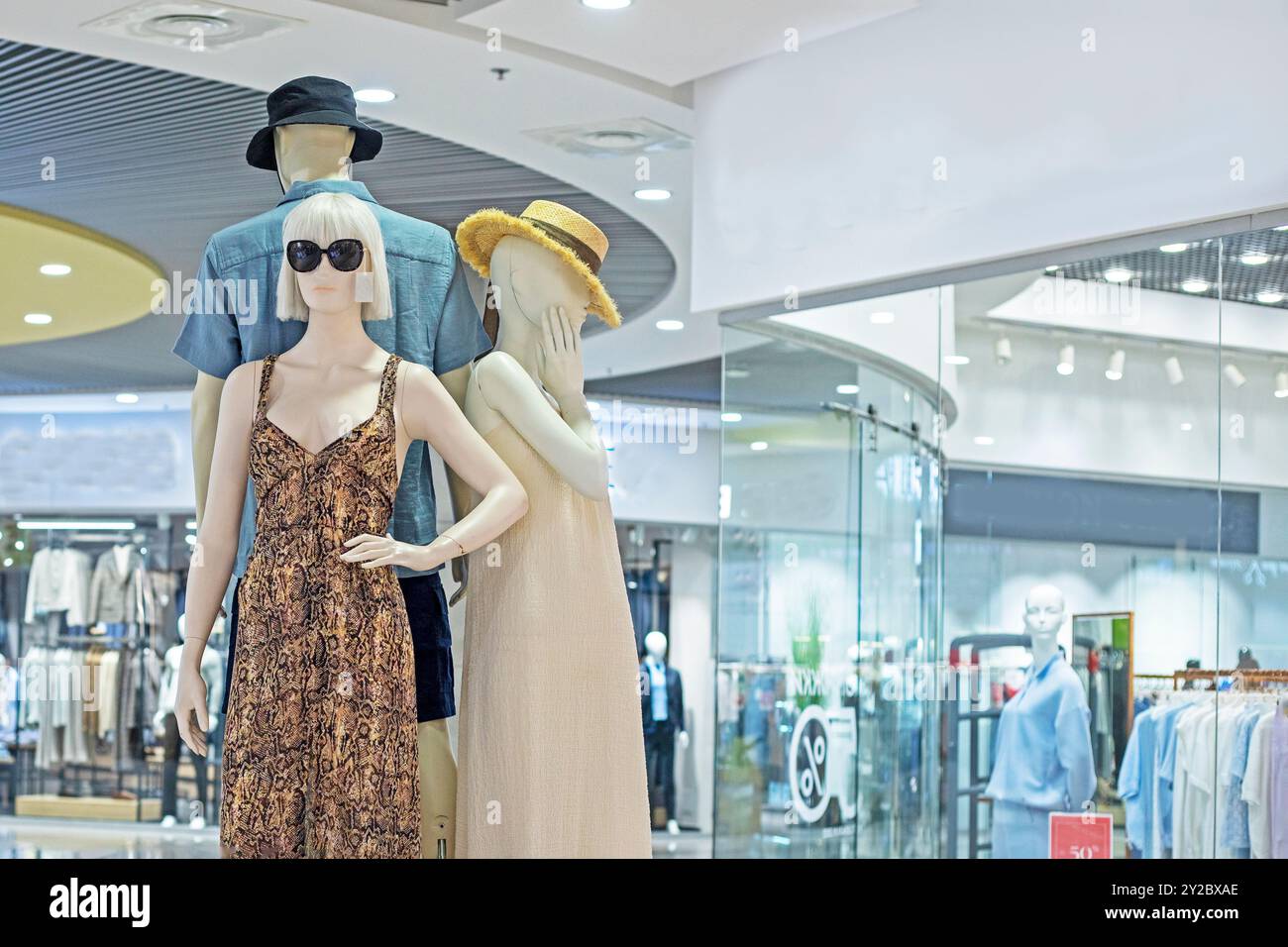 male and female mannequins in stylish clothes and accessories stylish ...
