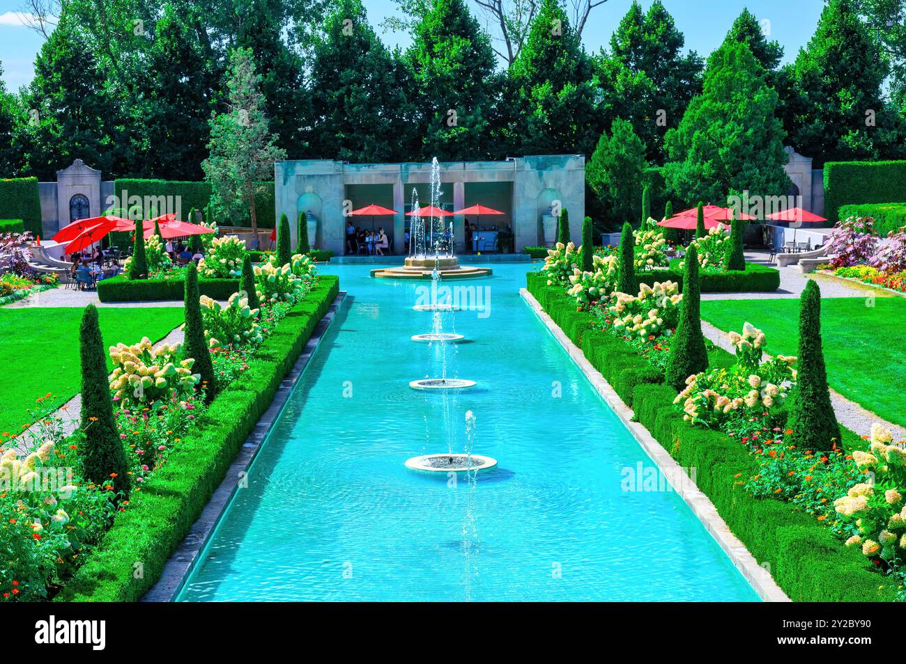 Fountain with flowing water in the formal gardens of the Parkwood ...