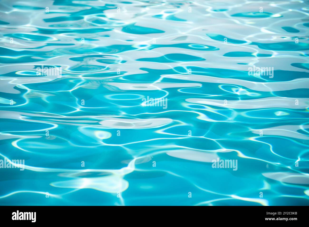 Water background. Blue water, ripples and highlights. Texture of water ...