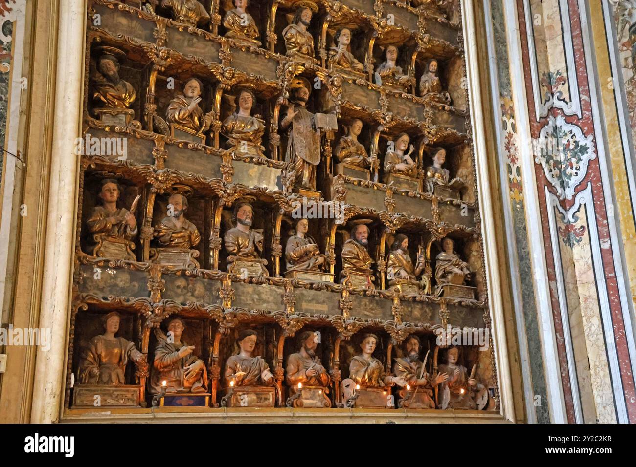 Small statues of many people in Gesu Nuovo Church (New Jesus Church) in ...