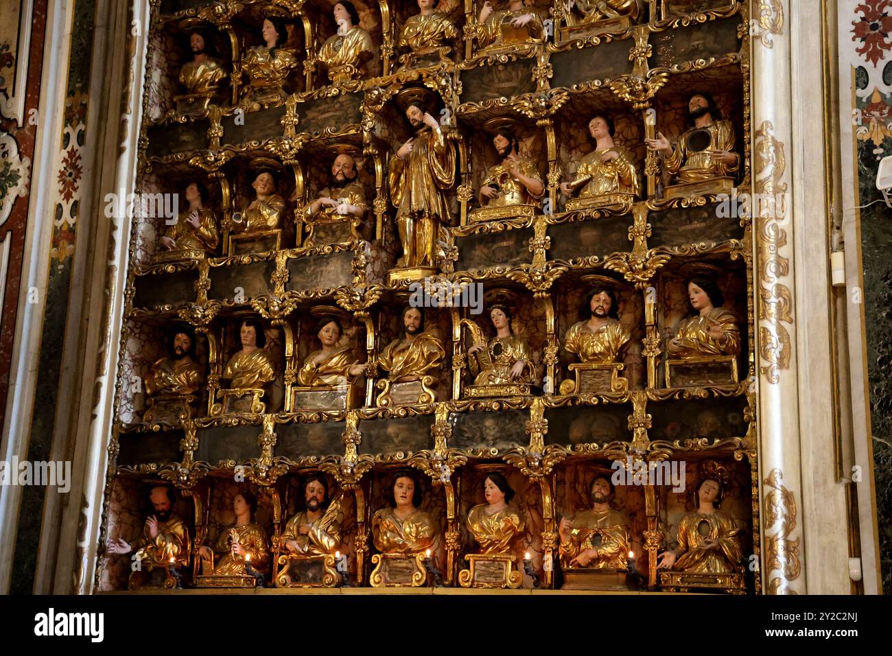 Small statues of many people in Gesu Nuovo Church (New Jesus Church) in ...