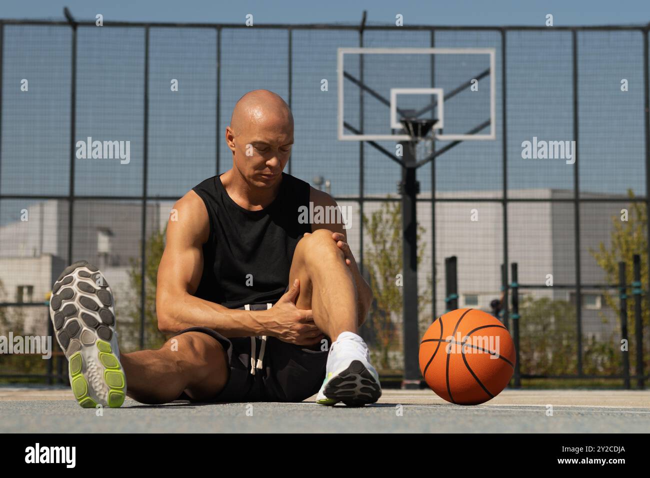 Basketball knee injury or pain . Basketball player check legs after ...